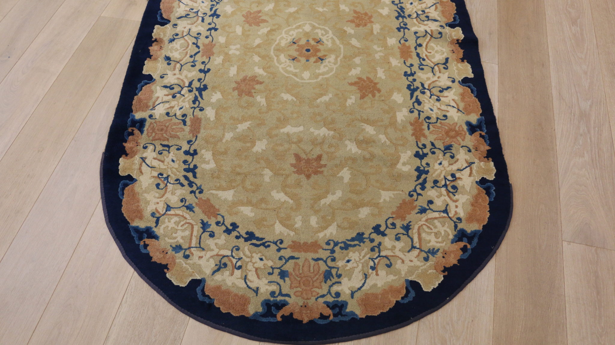 Pair of Chinese Oval Rugs – C. John