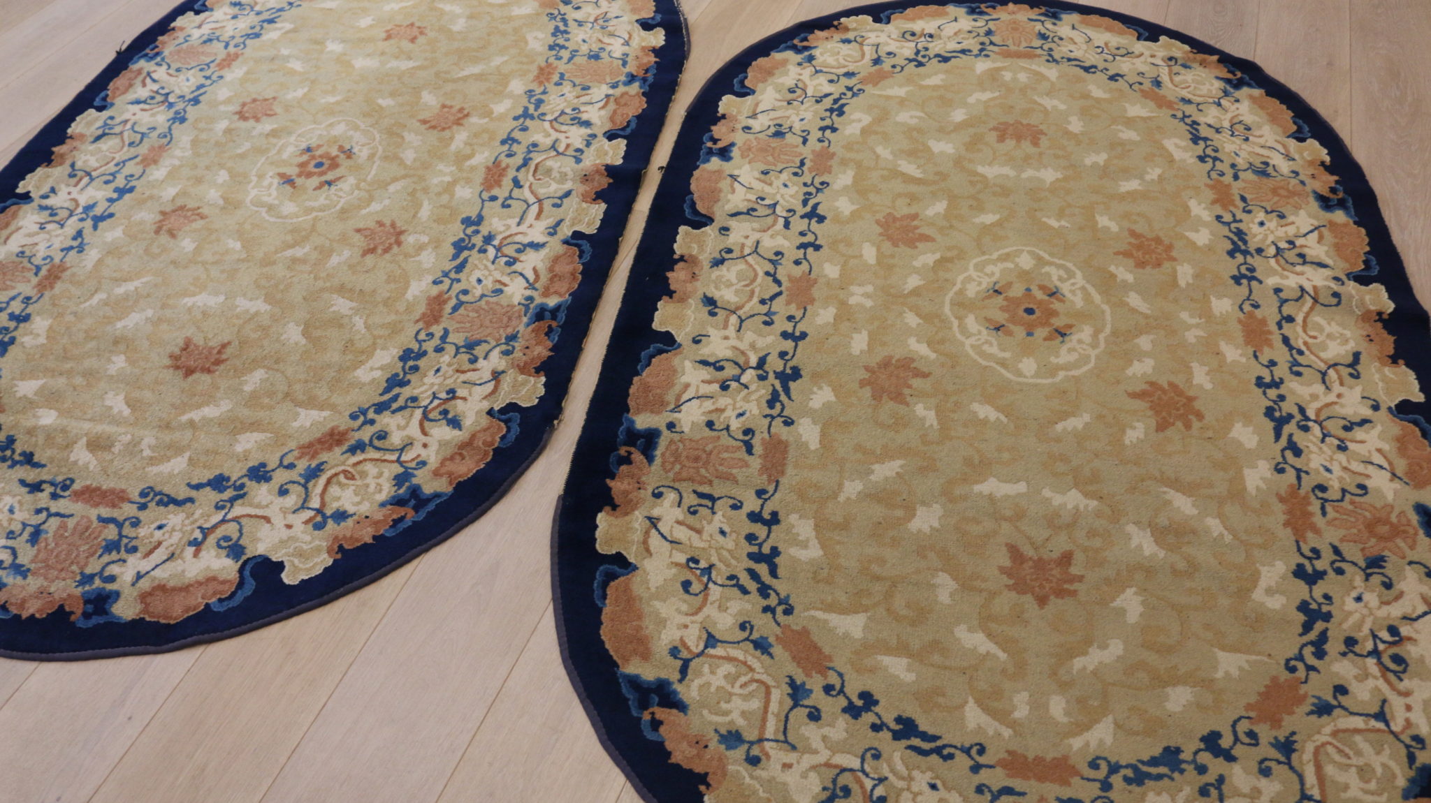Pair of Chinese Oval Rugs – C. John