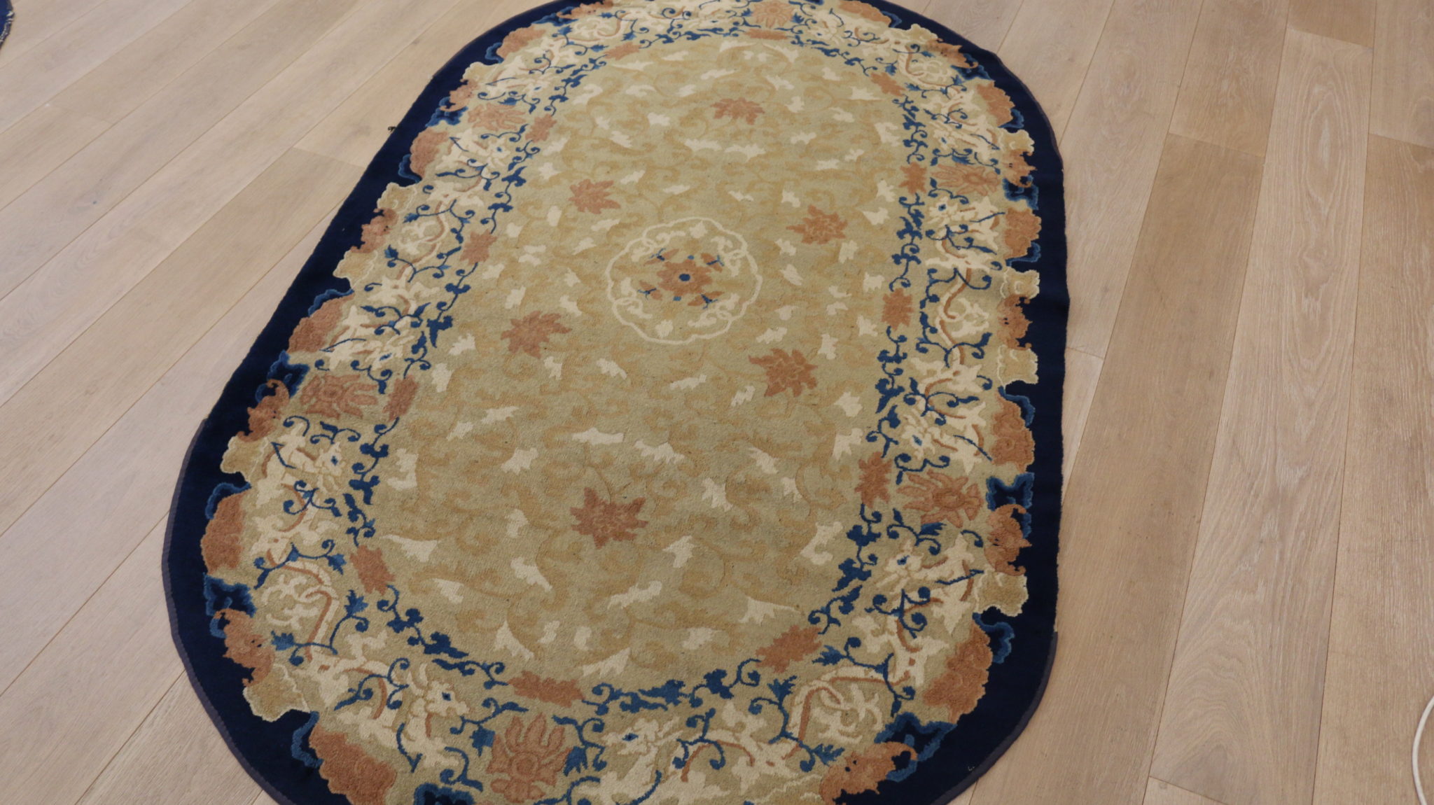 Pair of Chinese Oval Rugs – C. John